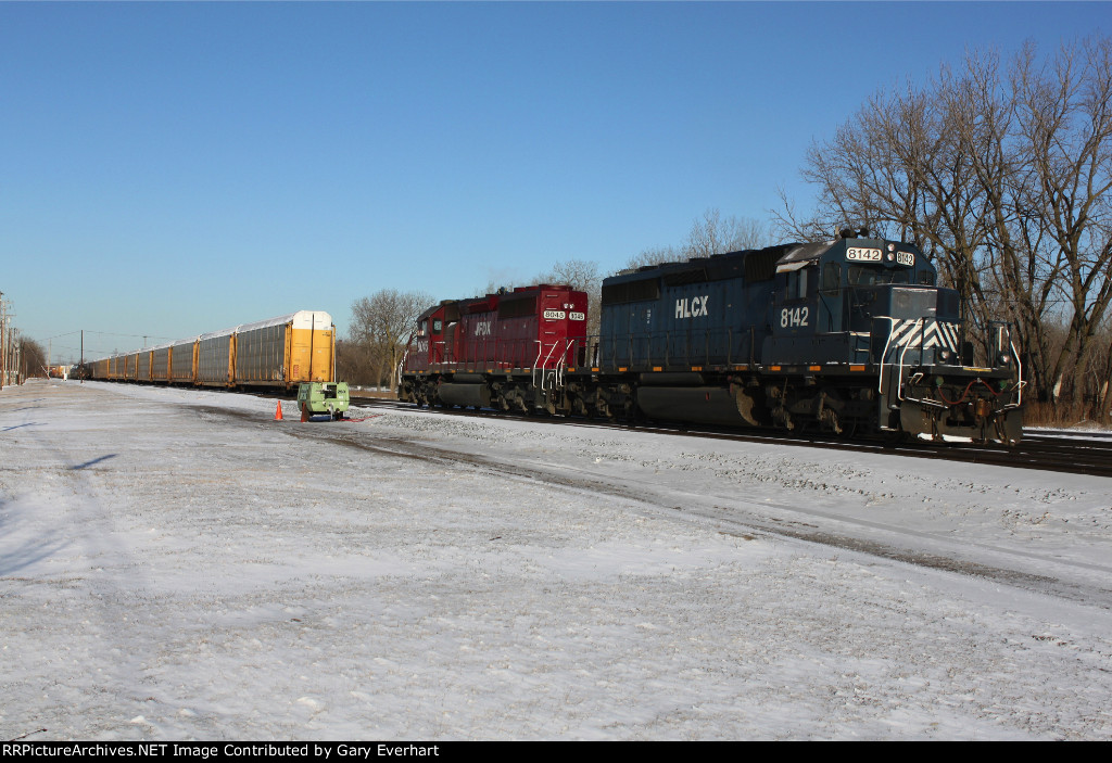 These two are sitting in this year's heavy snowfall! HLCX 8142 and JFDX 8045